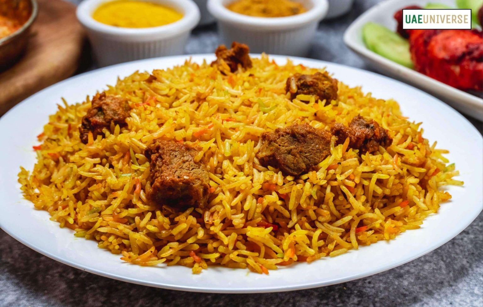 What is the national dish of UAE – Machboos or Khuzi